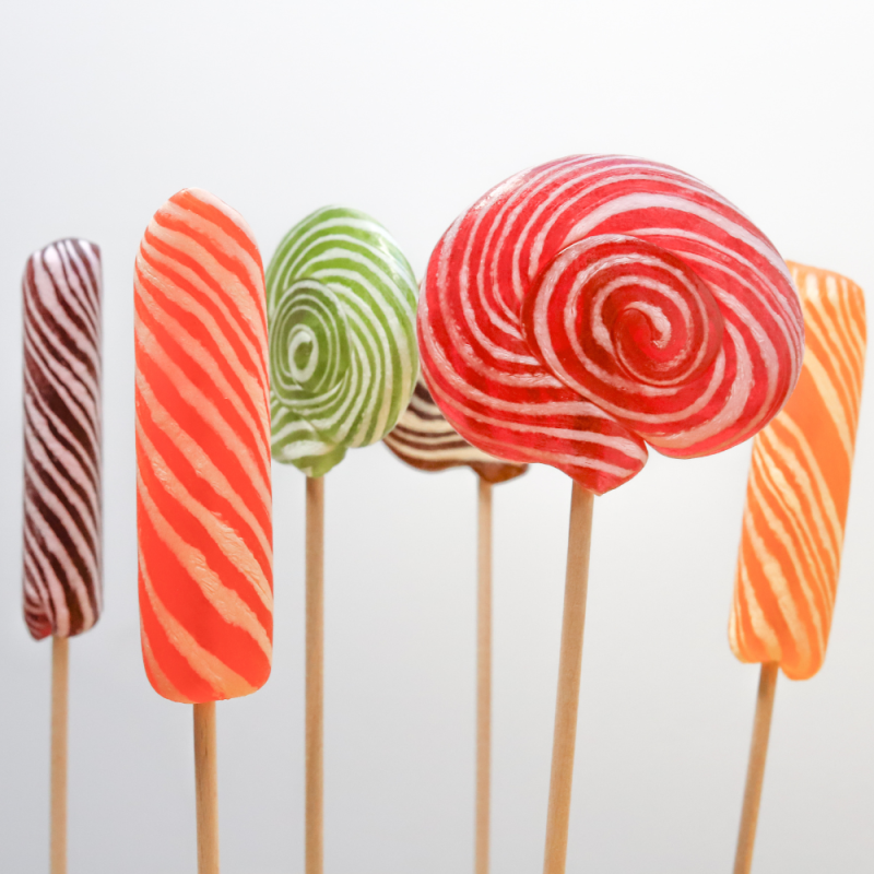 Grandes sucettes rondes et plates comme à la foire